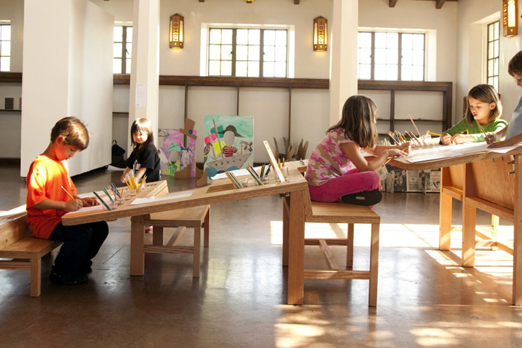A table designed to be shared across generations, fostering community ...